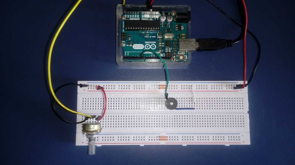 Projeto 36 - Controlando a frequência de um sonorizador com potenciômetro ~ Squids Arduino